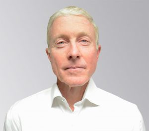 Robert Laird _ Headshot _ Grey Gradient _ Square - INDEVCO News